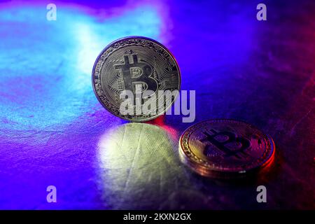 Representations of virtual currency Bitcoin is seen placed on keyboard ...