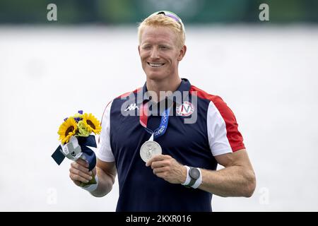 Silver medalist Kjetil Borch of Team Norway pose with his medal during ...