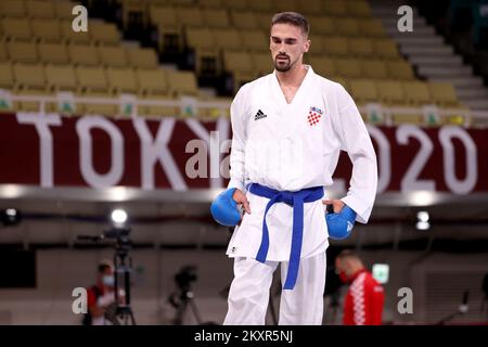 Ivan Kvesic of Team Croatia and Sajjad Ganjzadeh of Team Iran compete ...
