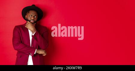 Fashion and party concept. Skeptical and doubtful african american man ...