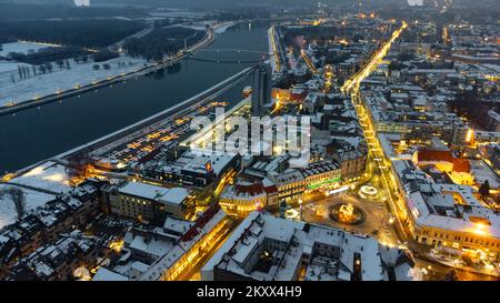 Aerial photo at dusk of the old part of the city of Osijek covered with ...