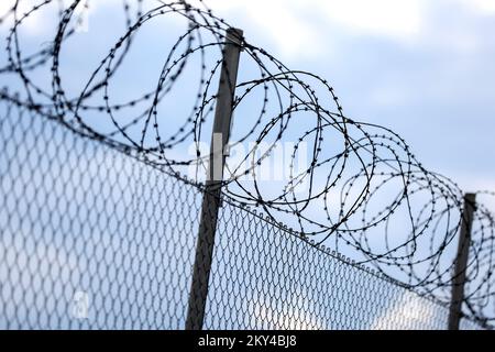 Concertina wire can be seen in the photo in Zagreb, Croatia on ...