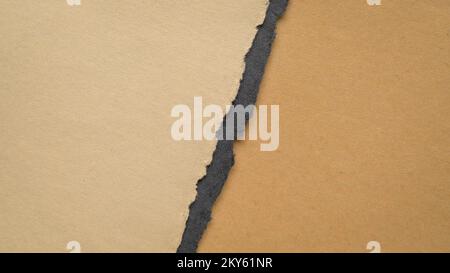 divided paper background in earth tones with a copy space Stock Photo ...