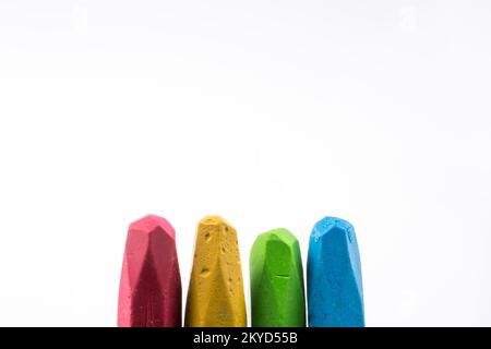 Colorful crayons side by side on a white background Stock Photo - Alamy