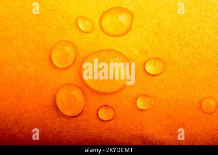 Round water drops in close-up view on colorful background Stock Photo ...