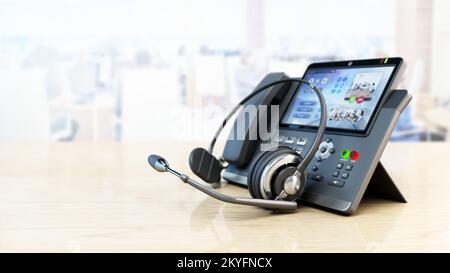 Modern VoIP phone and headset standing on wooden office table. Call ...