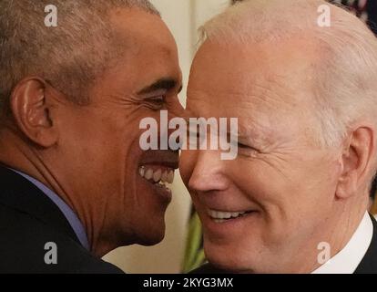 Former President Barack Obama hugs Wisconsin Democratic Gov. Tony Evers ...