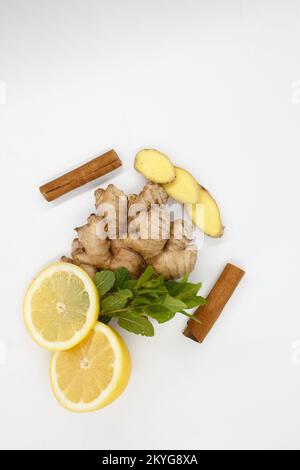 image of ginger or kion, accompanied by cinnamon and mint for infusion ...