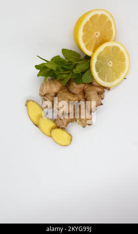 image of ginger or kion, accompanied by cinnamon and mint for infusion ...