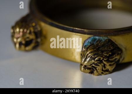 Close-up, golden blank for production of pocket watches, sketch and ...