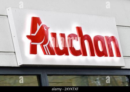 Illustration picture shows the sign of a Auchan store with the logo of ...