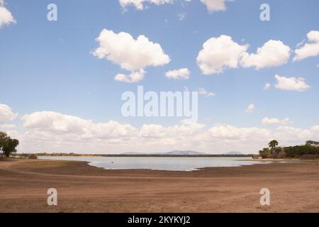 A drying watering hole with low water level in Nyerere national park ...