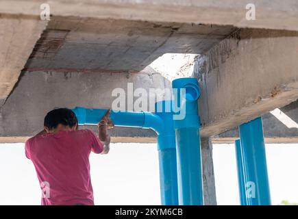 detail of a pvc drainage pipe and concrete roof forging Stock Photo - Alamy