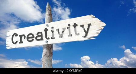 Vision - wooden signpost with one arrow Stock Photo - Alamy