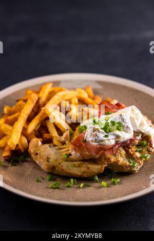 typical czech cuisine chicken slice baked with ham and camembert with ...