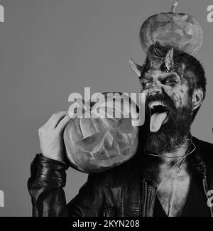 A male wearing pumpkin on head Stock Photo - Alamy