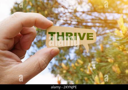 Ecology concept. A man holds a sign inside which the inscription - CO2 ...