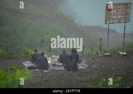Larung sesaji (Javanese thanksgiving) Gunung Kelud. Larungan is one of ...