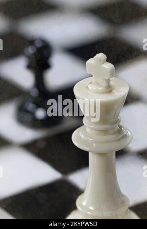 Lone piece of a chess king on a white background. Copy space on the ...