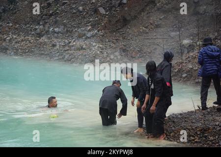 Larung sesaji (Javanese thanksgiving) Gunung Kelud. Larungan is one of ...