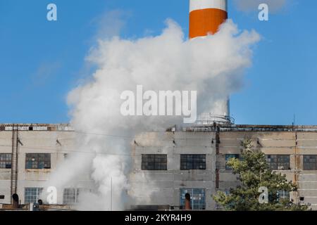 Emission of caustic toxic steam smoke at the plant industry and ...