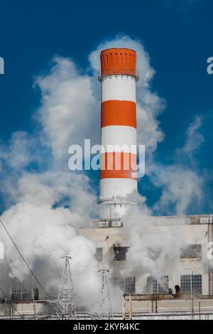 Emission of caustic toxic steam smoke at the plant industry and ...