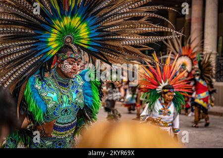 Indigenous man wearing a flamboyant head dress at the Danza de Indios ...