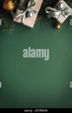 Vertical banner with many gift boxes with paper decorations on olive ...