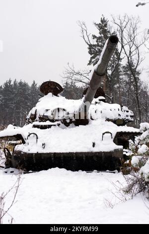 Russian battle tank in the snow which was destroyed on the roadside of ...