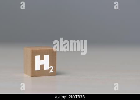 wood cube block hydrogen on table Stock Photo - Alamy