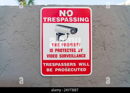 Protected Place sign on a fence Singapore Stock Photo - Alamy