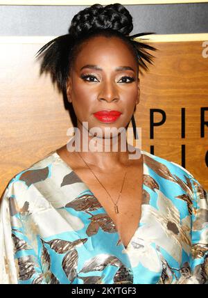 BEVERLY HILLS, CALIFORNIA - DECEMBER 01: (L-R) Tanya Moodie and Micheal ...