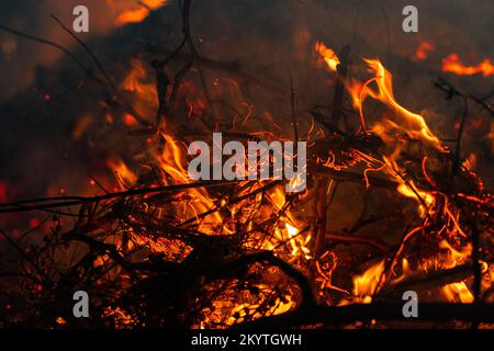 Big bond fire with a lot of smoke and open flames Stock Photo - Alamy