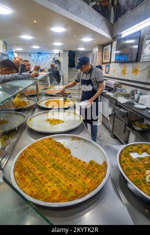 Shop selling Jordanian sweets in Amman Jordan Stock Photo - Alamy
