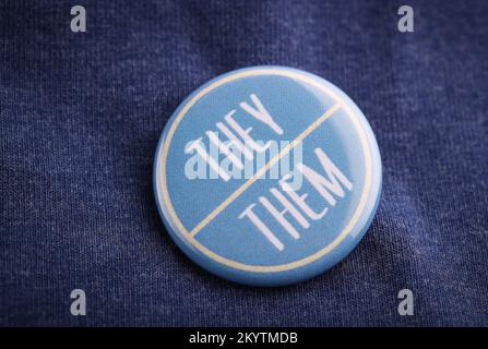 A person showing their They Them pronouns by wearing a badge Stock ...
