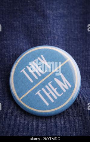A person showing their They Them pronouns by wearing a badge Stock ...
