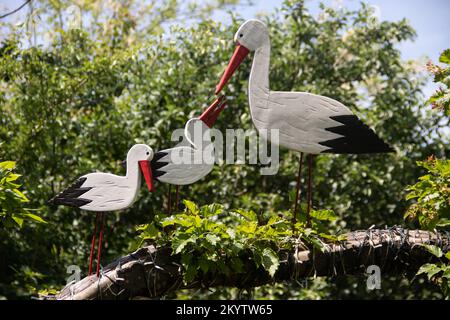 Wooden storks as an decoration in backyard of country side weekend ...