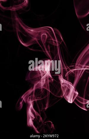 Magenta wisp of smoke on black background. Concept poster of color of ...