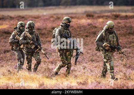 Dutch Soldiers of the 11th Airmobile Brigade walking after drop off ...