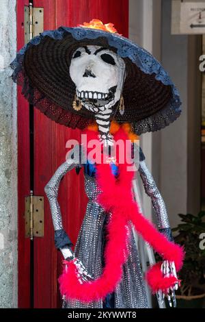 A La Catrina mannequin in costume on the street to celebrate the Day of ...