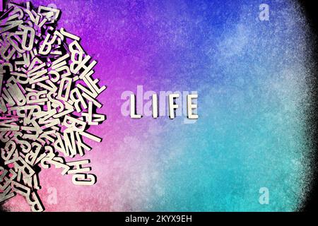 pile of wooden English language capital letters spilling into words ...