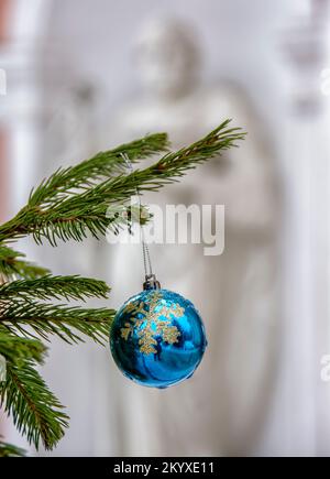 A spruce branch decorated with balls before the New Year Stock Photo ...