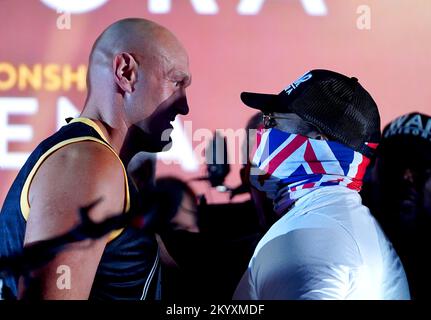 Tyson Fury and Derek Chisora face off during the weigh-in at the ...