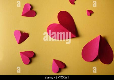 Hearts of paper on red textured background. San Valentine day concept ...
