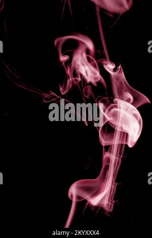 Magenta wisp of smoke on black background. Concept poster of color of ...