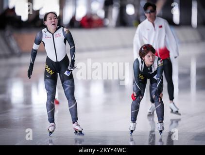 Konami Soga of Japan her teammate Yukino Yoshida catch their breath ...