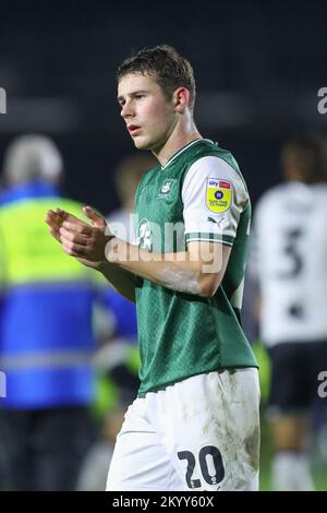 Adam Randell of Plymouth Argyle applauds the fans at full time looks ...