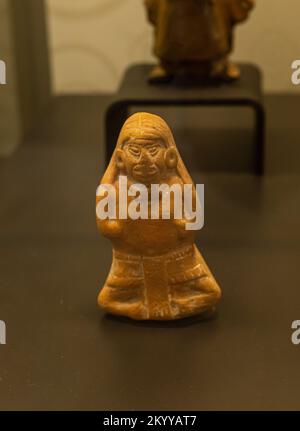 Maya ceramic figure of a woman wearing a hat. Late classic period ...