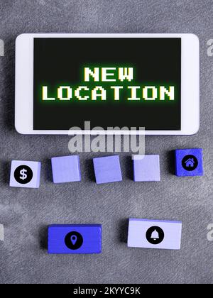 Hand writing sign New Location, Business approach Get located on a new ...