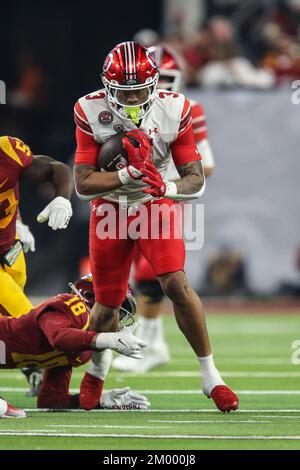 Utah running back Ja'Quinden Jackson (3) runs the ball against USC in the Pac 12 Championship ...
